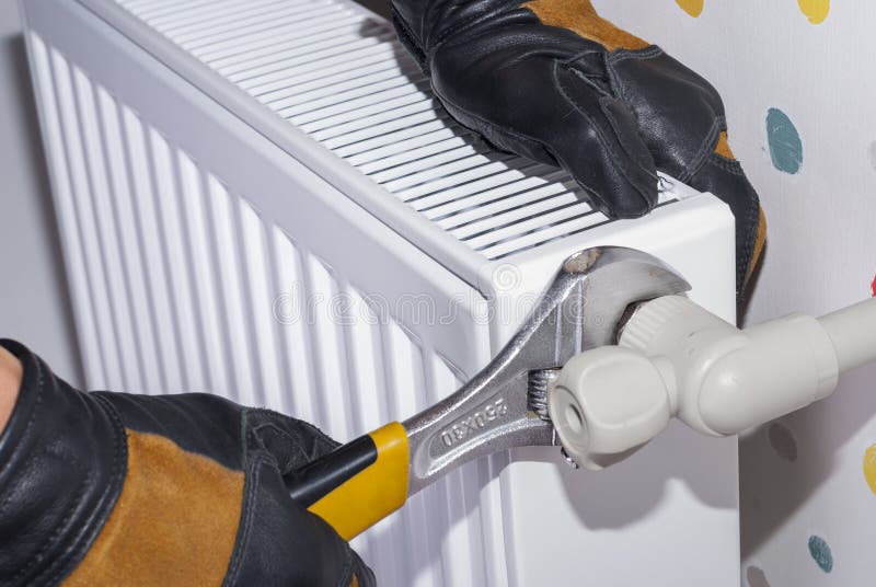 Heating Radiator Installation Stock Photo - Image of plumber ...