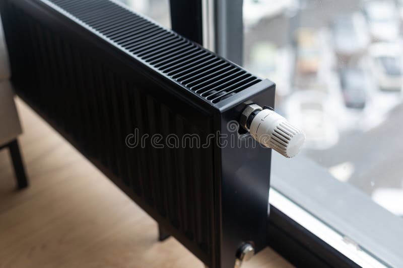 Heating Radiator in Room with Laminated Wooden Floor Stock Image ...