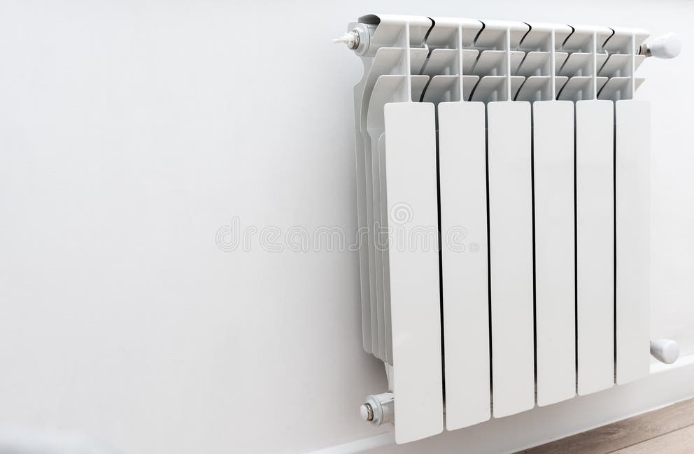 Heating Radiator Sections on the Wall Stock Image - Image of domestic ...