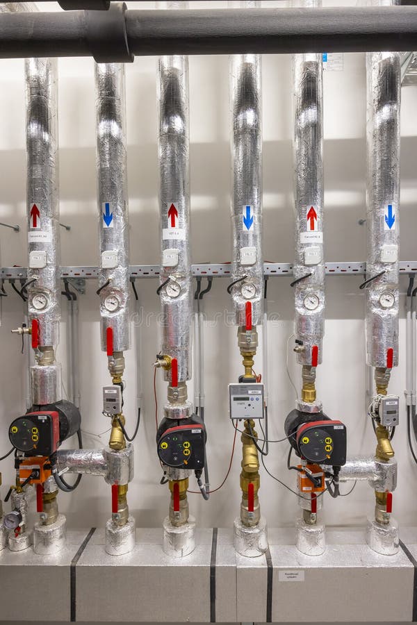 Heating System Pipes and Pumps Regulating Temperature in the Building ...