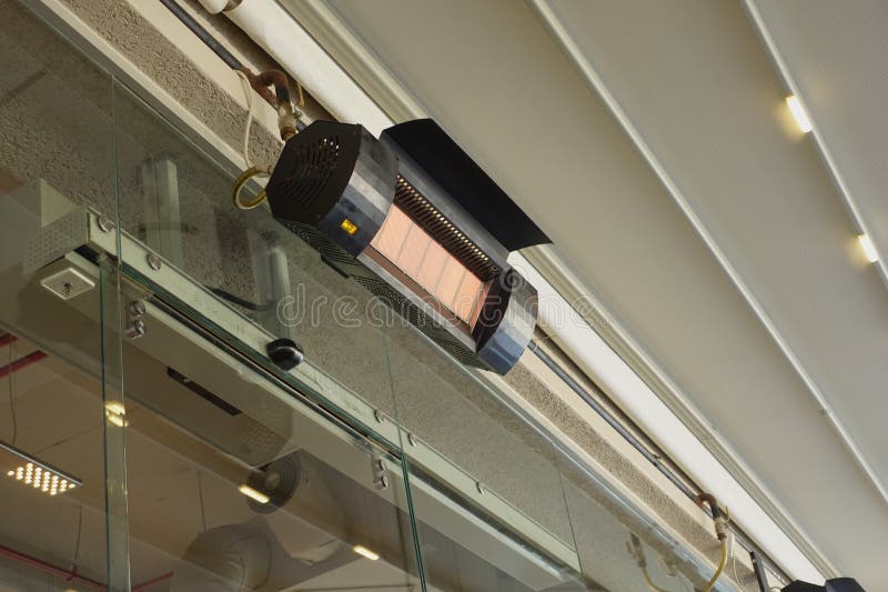 Heating Unit Installed Above Glass Panel in Modern Indoor Space Stock ...