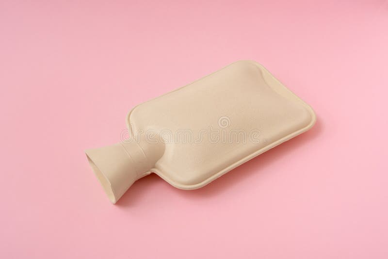 Heating Water Pad on Pink Background. Heat or Cooling Therapy. Solving ...