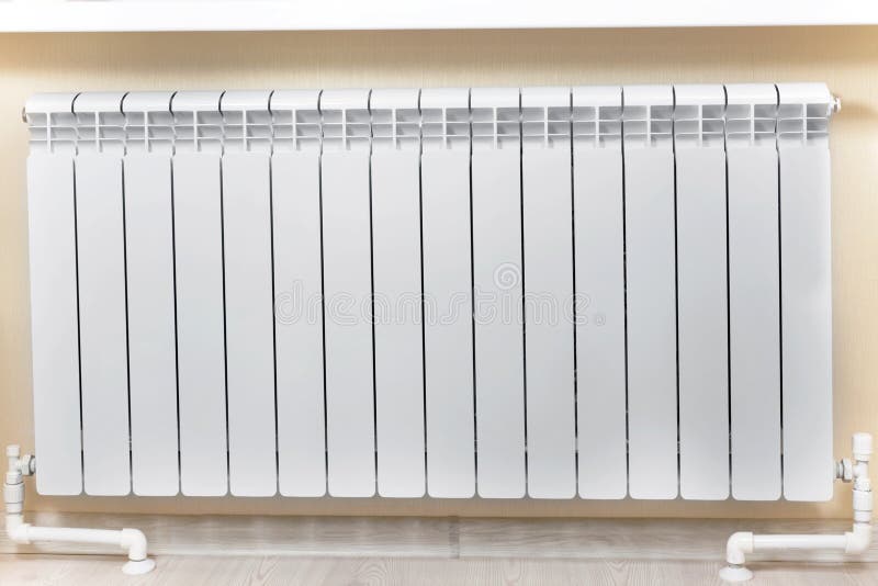 Pipes and a White Heating Radiator Heat the Room Stock Image - Image of ...