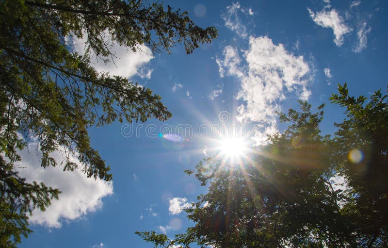 Sunburst out of clouds stock photo. Image of spectacle - 3490500