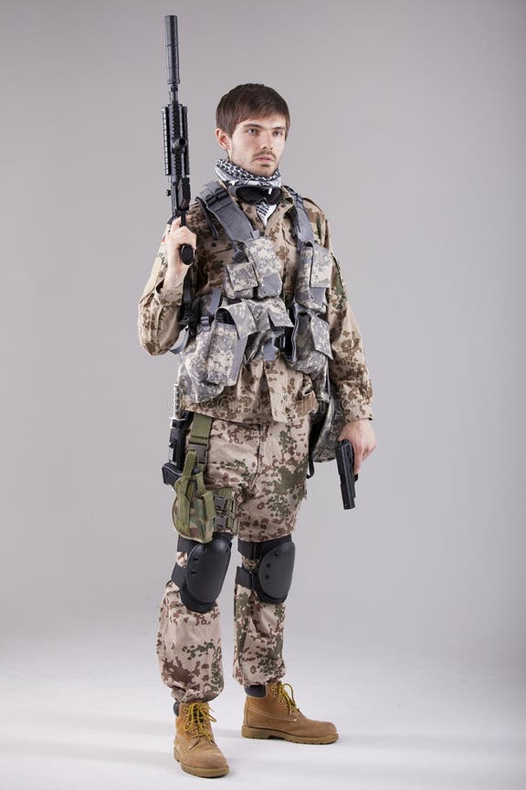 Heavy Armed Soldier stock image. Image of male, combat - 25024499