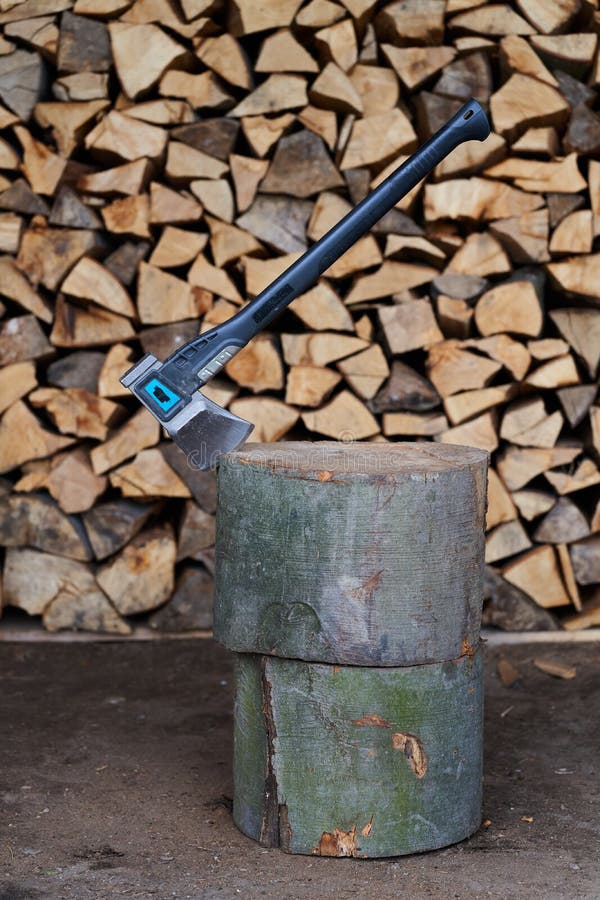 Heavy ax and split wood stock photo. Image of firewood - 217444006