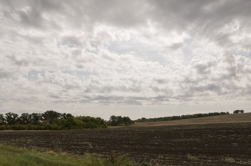 Heavy Big Grey Clouds in the Cold Autumn Sky Over Fields, Forests and ...
