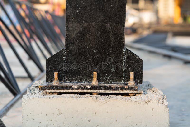 Metal Column on Concrete Base of the Building Structure. Stock Photo ...