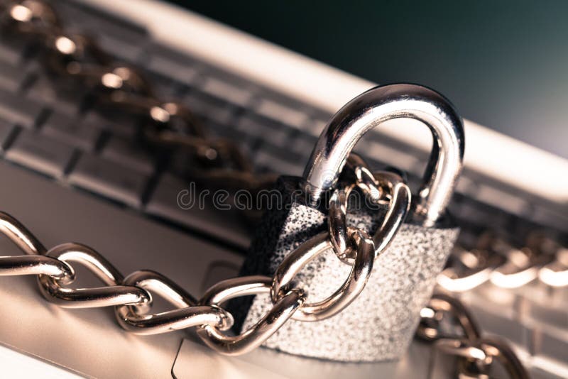 Heavy Chain with a Padlock Around a Laptop, Close Stock Image - Image ...