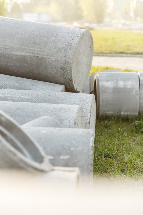 Heavy concrete pipes stock photo. Image of close, pipe - 67711374