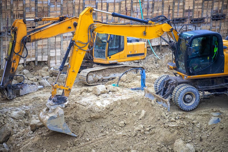 Heavy Construction Equipment Working at the Construction Site Stock ...