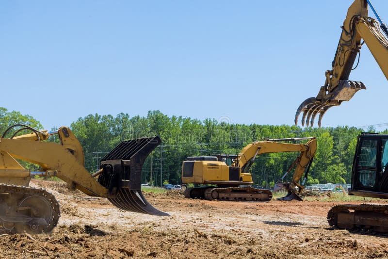 Heavy Construction Equipment Works on a Construction Site Stock Photo ...