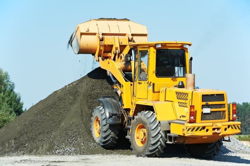 Heavy construction loader stock image. Image of machine - 20985259