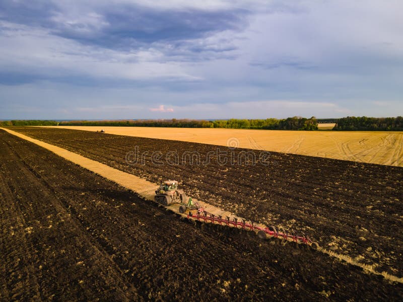 Heavy Crawler Tractor in the Field Plowing Stock Photo - Image of ...
