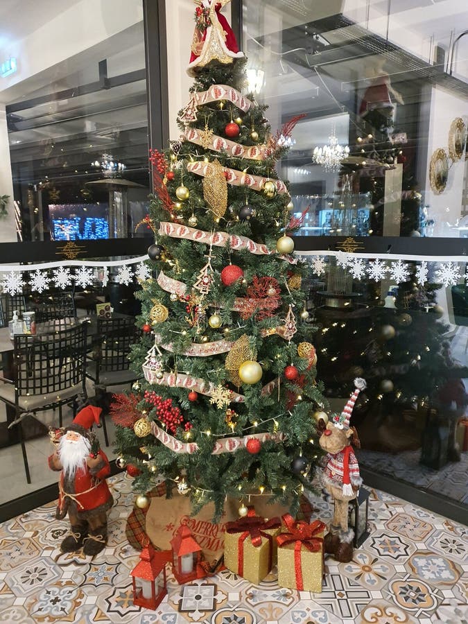 A Heavy Decorated Christmas Tree Stock Image - Image of heavy, person ...