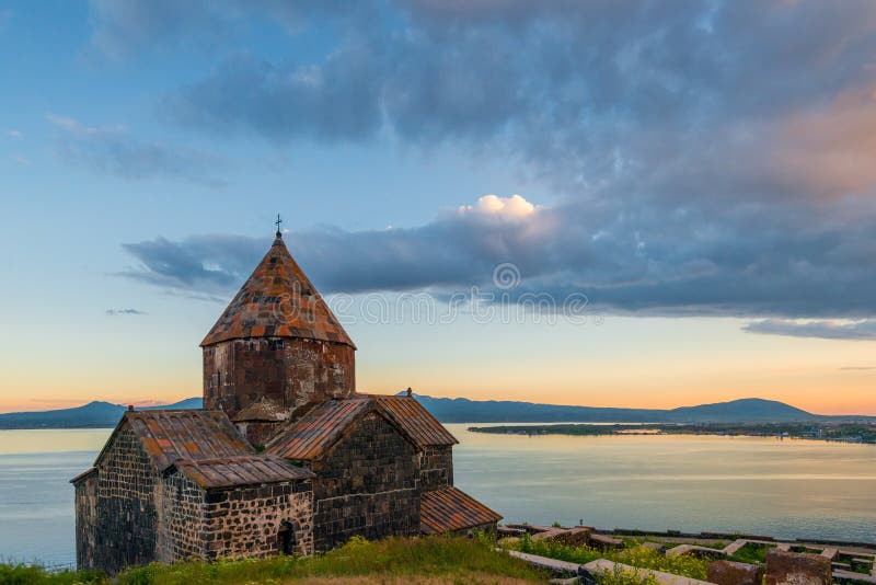 Heavy Dramatic Clouds Over Lake Sevan and Sevanavank Monastery Stock ...