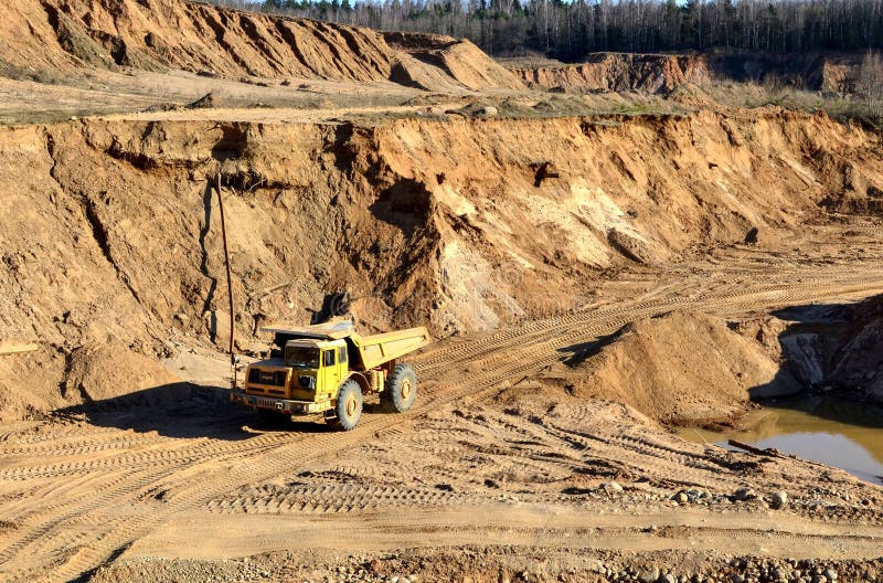 Heavy Dump Truck Working in a Sand Pit Stock Photo - Image of dirt ...