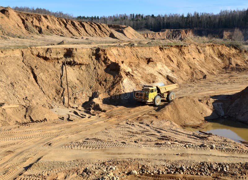 Heavy Dump Truck Working in a Sand Pit Stock Photo - Image of large ...