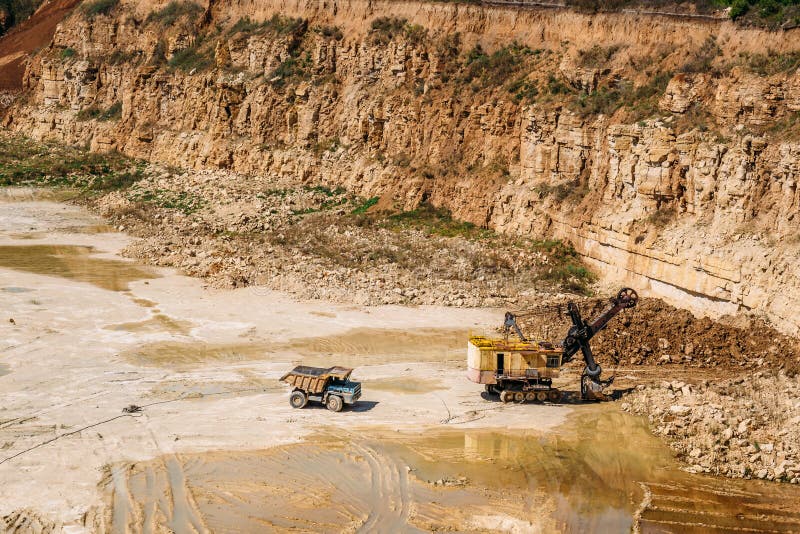 Heavy Duty Machines Work in a Quarry, Quarry Equipment Concept Stock ...