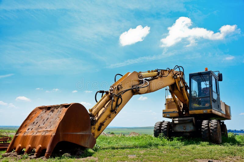 Heavy Earth Mover and Blue Sky, Excavator Machine Stock Image - Image ...