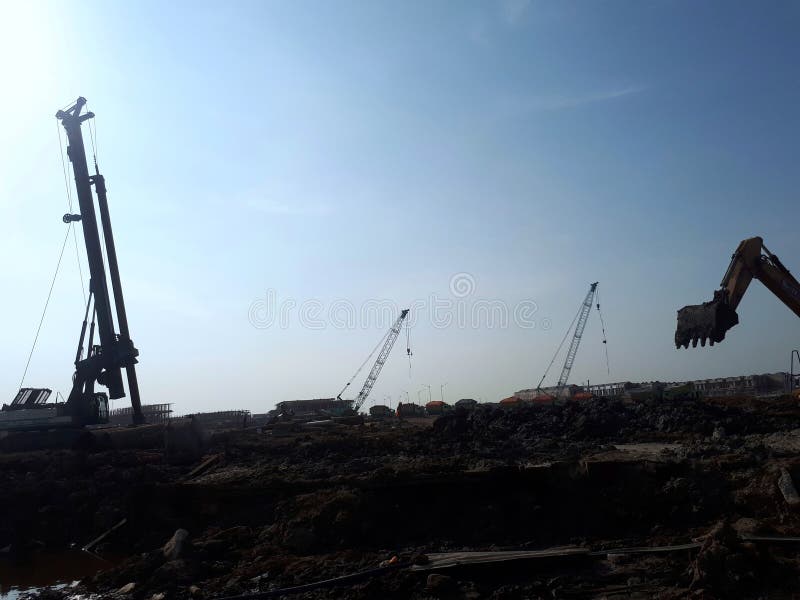 Heavy Equipment on Construction Site in the Morning Stock Photo - Image ...