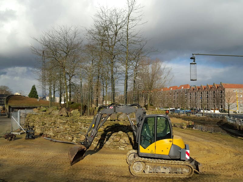 Heavy Equipment at Construction Site Stock Image - Image of storm, grey ...