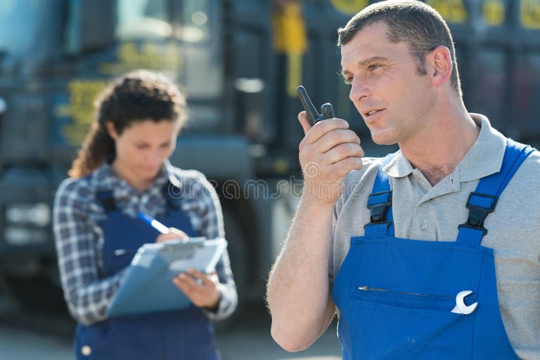 Heavy Equipment Operator Using Walkie Talkie Stock Photo - Image of ...