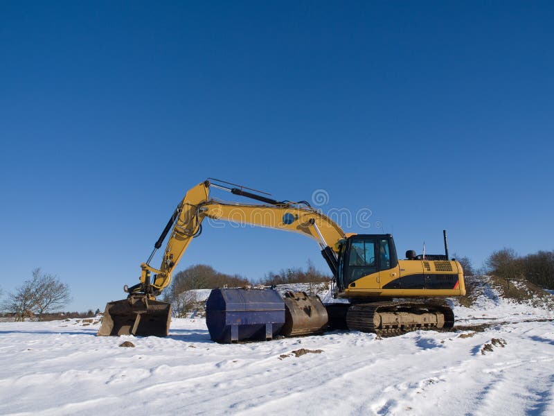 Heavy equipment in snow stock photo. Image of natural - 8178888