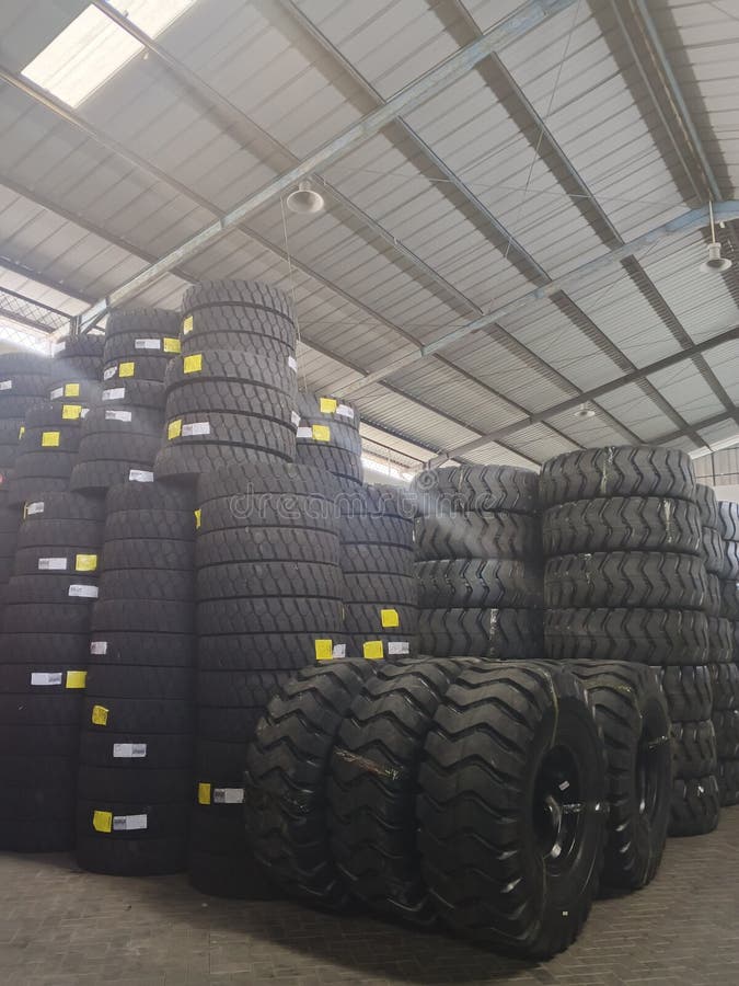 Heavy Equipment Tires stock image. Image of warehouse - 372408633