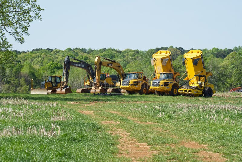Heavy Equipment Loading Huge Logs in a Trailer Stock Photo - Image of ...