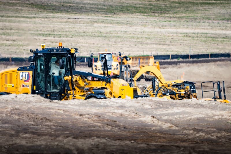 Heavy Equipment at Work Developing Land for Residential Homes ...