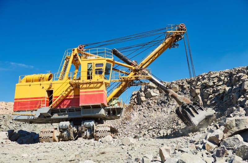 Excavator Works with Granite or Ore at Opencast Mining Stock Photo ...