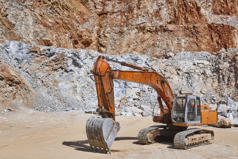 Heavy Excavator on a Quarry. Excavation Machinery. Earthmover Work ...