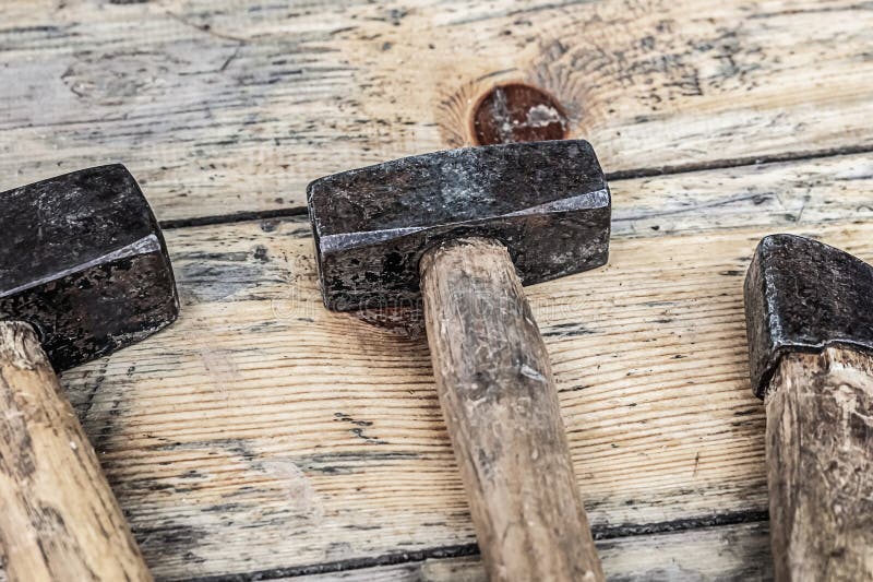 Heavy Hammer, Sledgehammer and Ax Builder Tool with Wooden Handle Stock ...