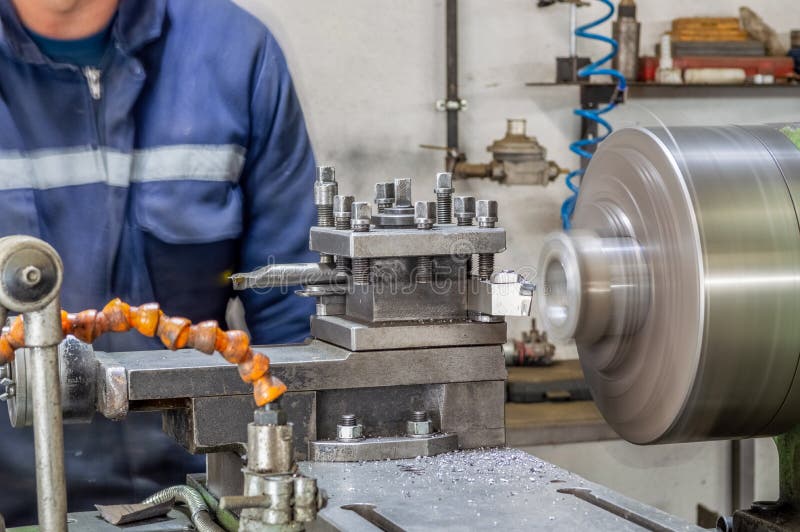 Heavy Industrial Worker Operator Working with Lathe Machine Stock Photo ... Heavy Industrial Worker Operator Working with Lathe Machine Stock Photo ...