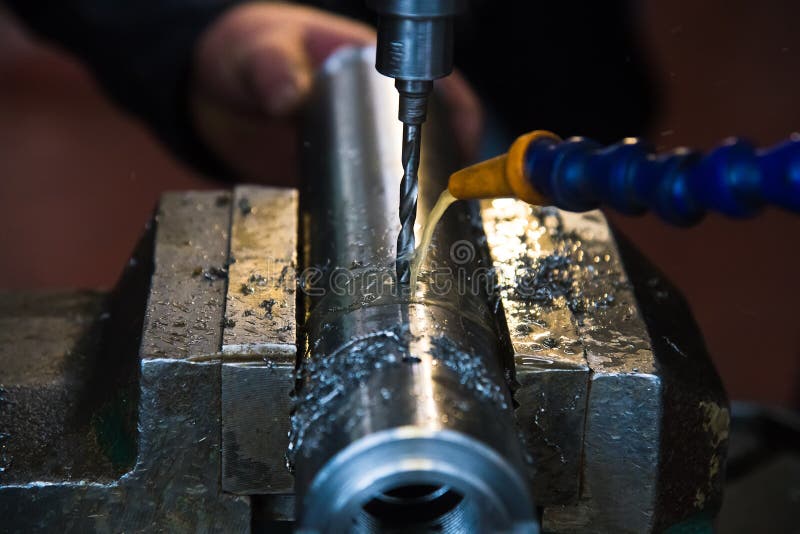Heavy Industrial Worker Performs a Mechanical Operation on a Machine ...