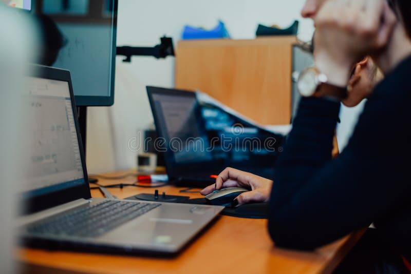 Within the Heavy Industry, a Factory Industrial Engineer Measures with ...