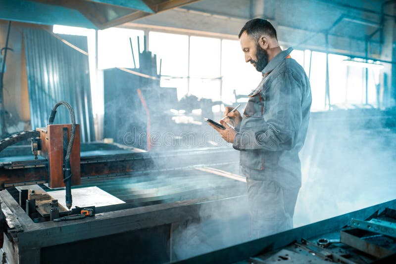 Heavy Industry Worker Controlling the Process of Metal Cutting Stock ...