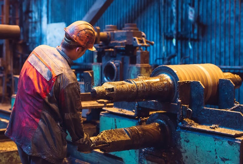 Heavy Industry Worker Working Machine. Rough Industrial Environment ...