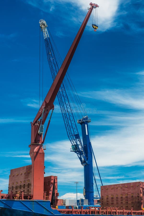 Heavy Lifting Crane on the Vessel and Commercial Port Stock Image ...