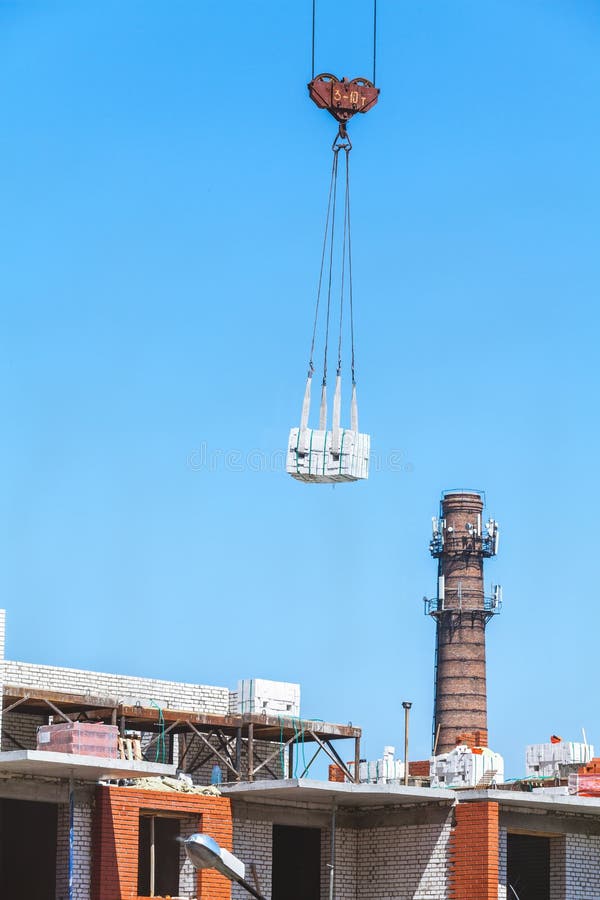 Heavy Load Hanging on Construction Site of Brick Building Stock Image ...