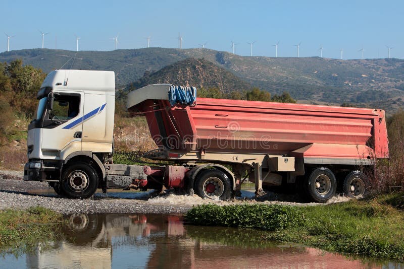 Heavy Lorry or Truck Drives through Small River Stock Photo - Image of ...