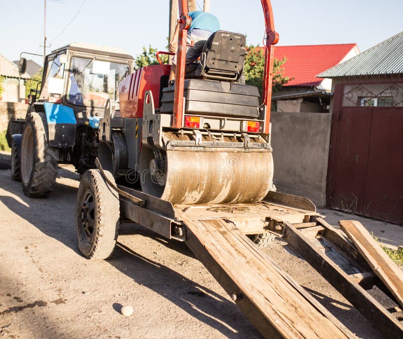 Heavy Machine Rolls a New Asphalt Road Stock Image - Image of technical ...