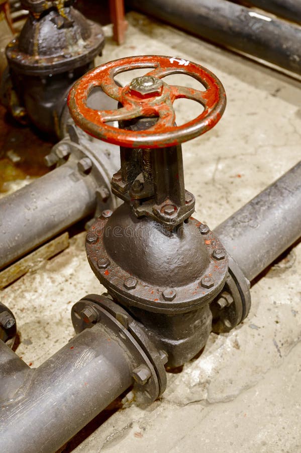 Rusty Valve and Pipes in Industrial Setting Demonstrating Mechanical ...