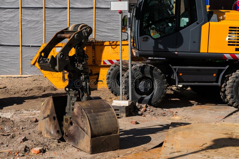 Heavy Machinery at Construction Site with Grappling Attachment Stock ...
