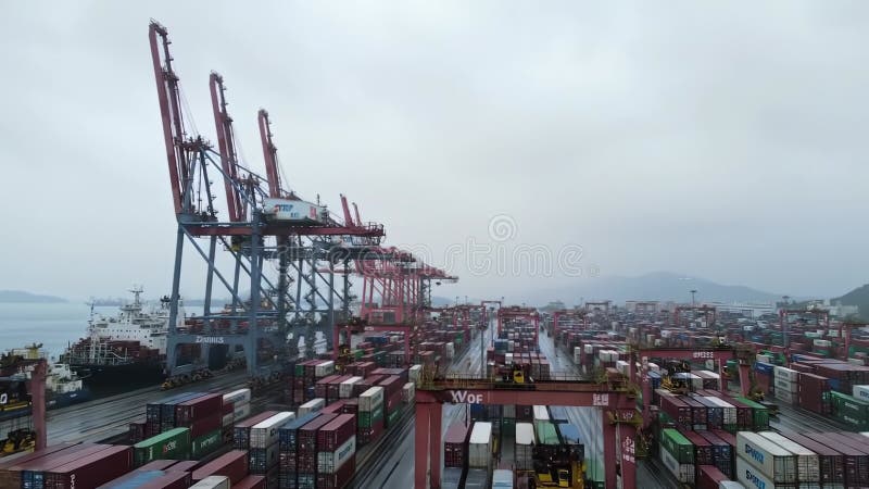 Busy Container Port Operations in an Industrial Area with Cranes ...
