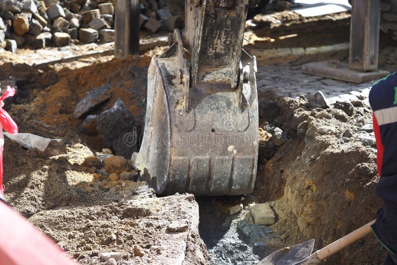 Excavation Work in Progress at a Construction Site during Daylight ...