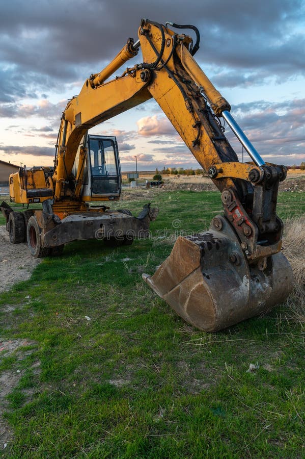 Heavy Machinery, Excavators at a Construction Site with Stone and Rock ...