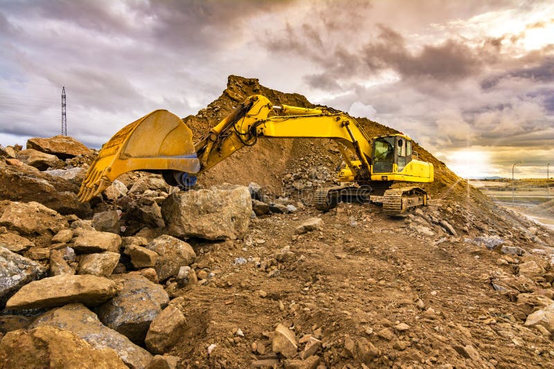 Heavy Machinery Moving Stone and Rock in an Open Mine Stock Image ...