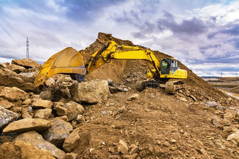 Heavy Machinery Moving Stone and Rock in an Open Mine Stock Image ...